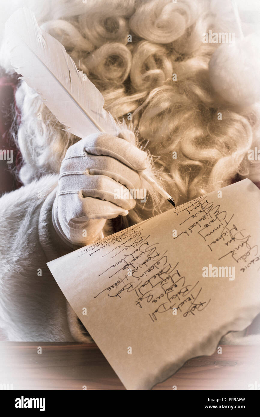 Santa Claus checks his list twice Stock Photo - Alamy