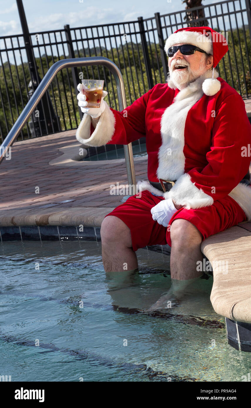 Santa Claus on Vacation at Poolside, Florida, USA Stock Photo - Alamy