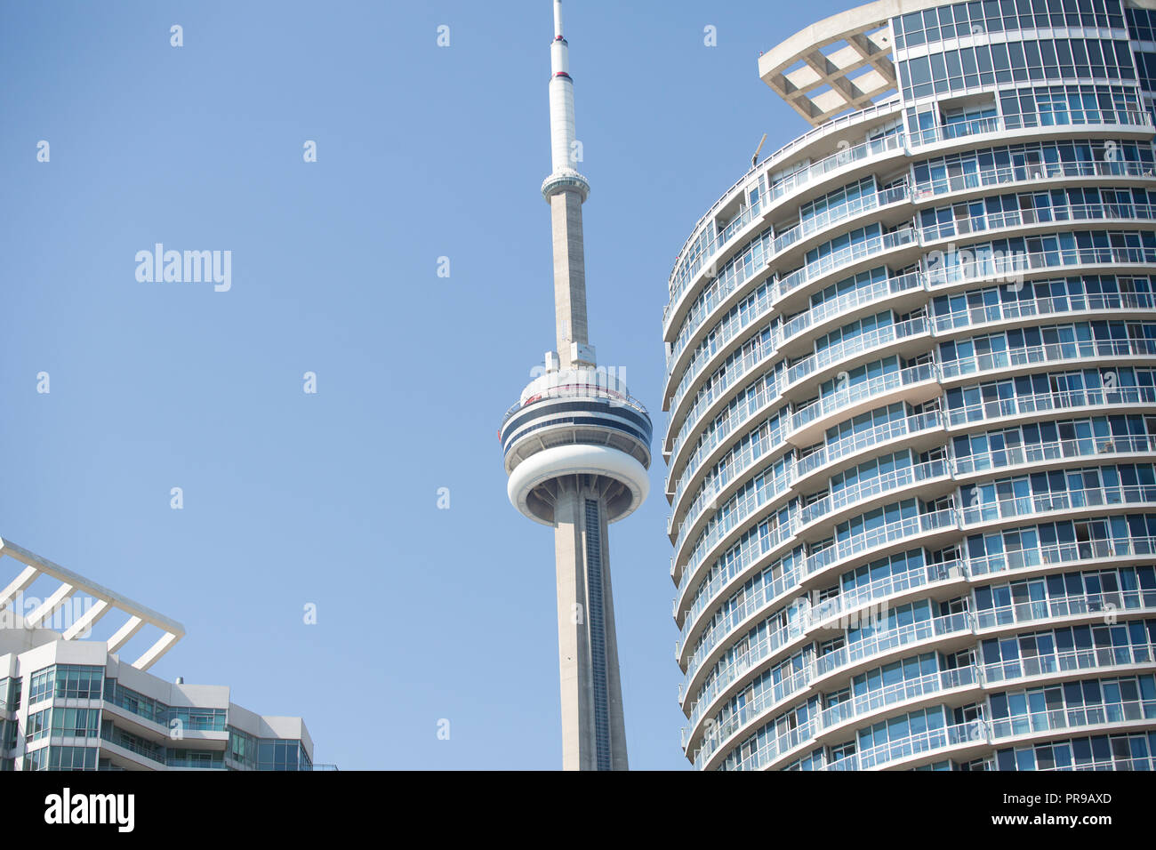 toronto cn tower between two condo buildings downtown Stock Photo - Alamy