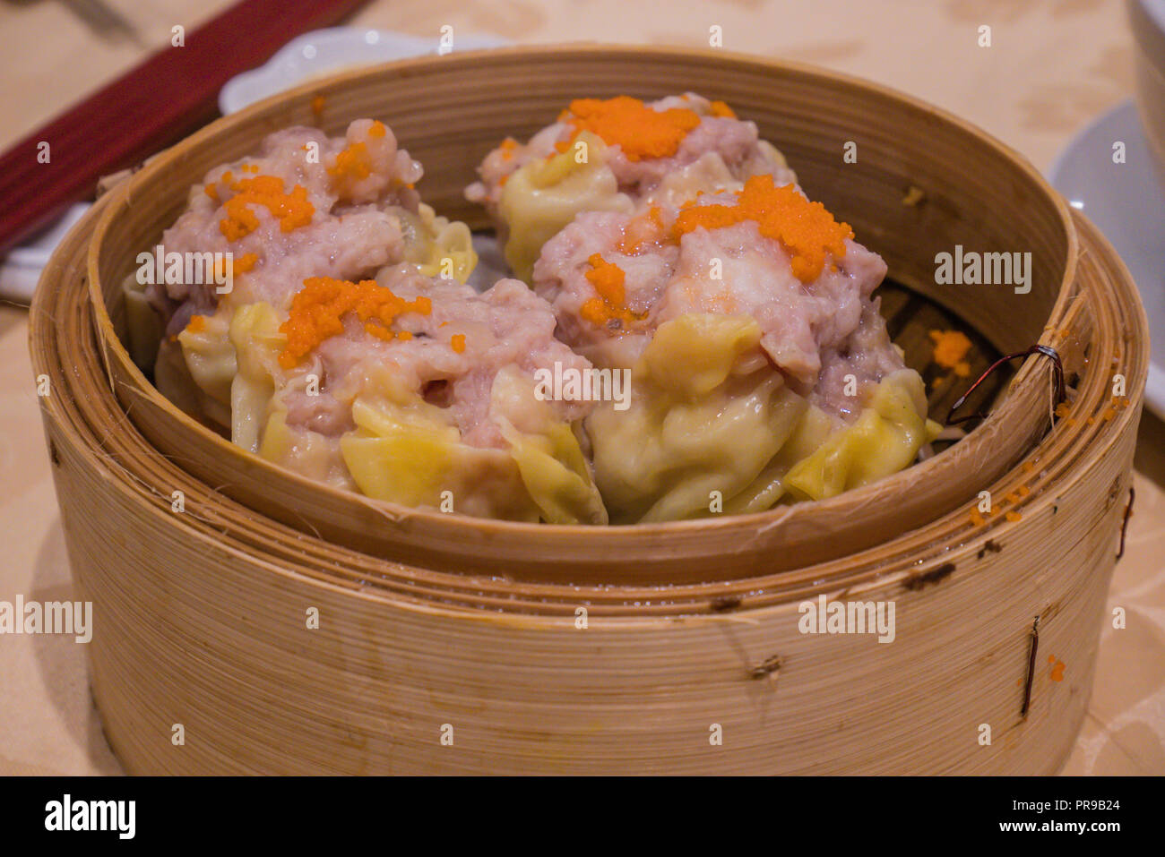 siu ma served in bamboo container is a traditional chinese dim sum ...