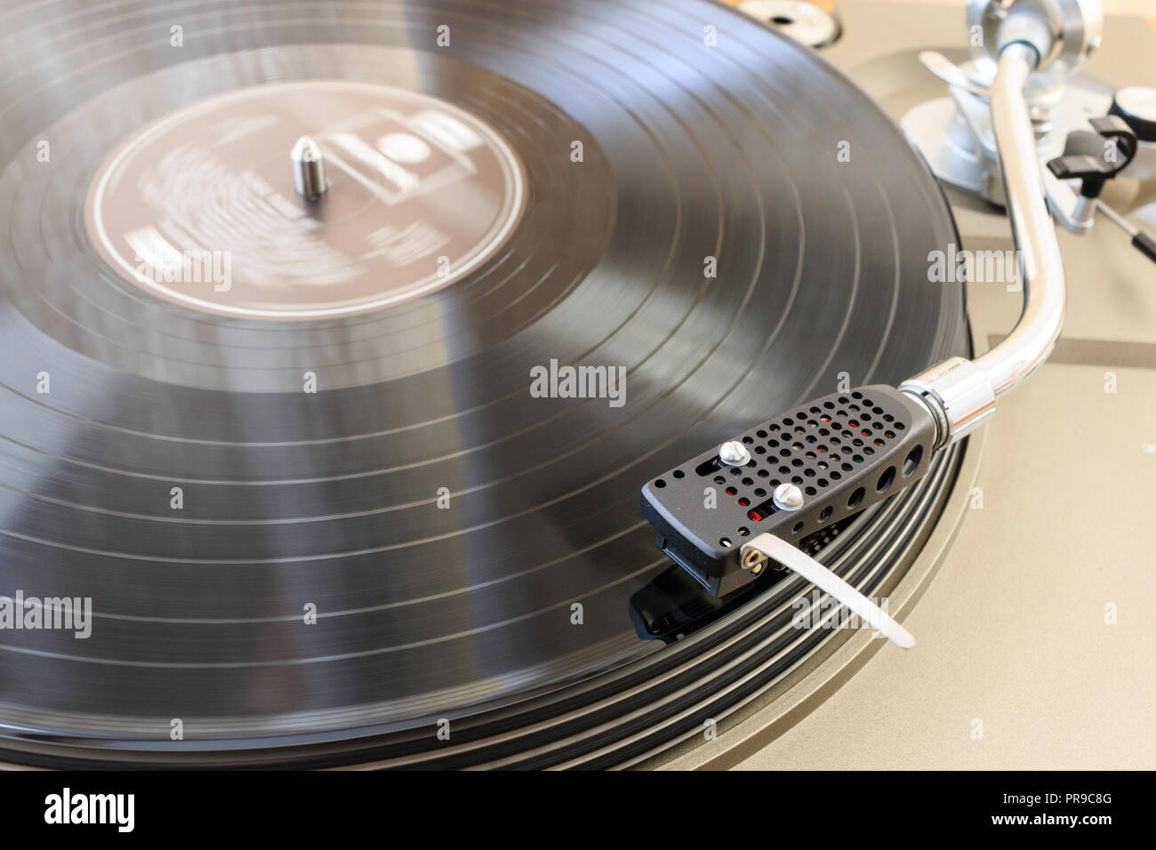 Record player, deck. 'S' shape tone arm playing long player record, LP ...
