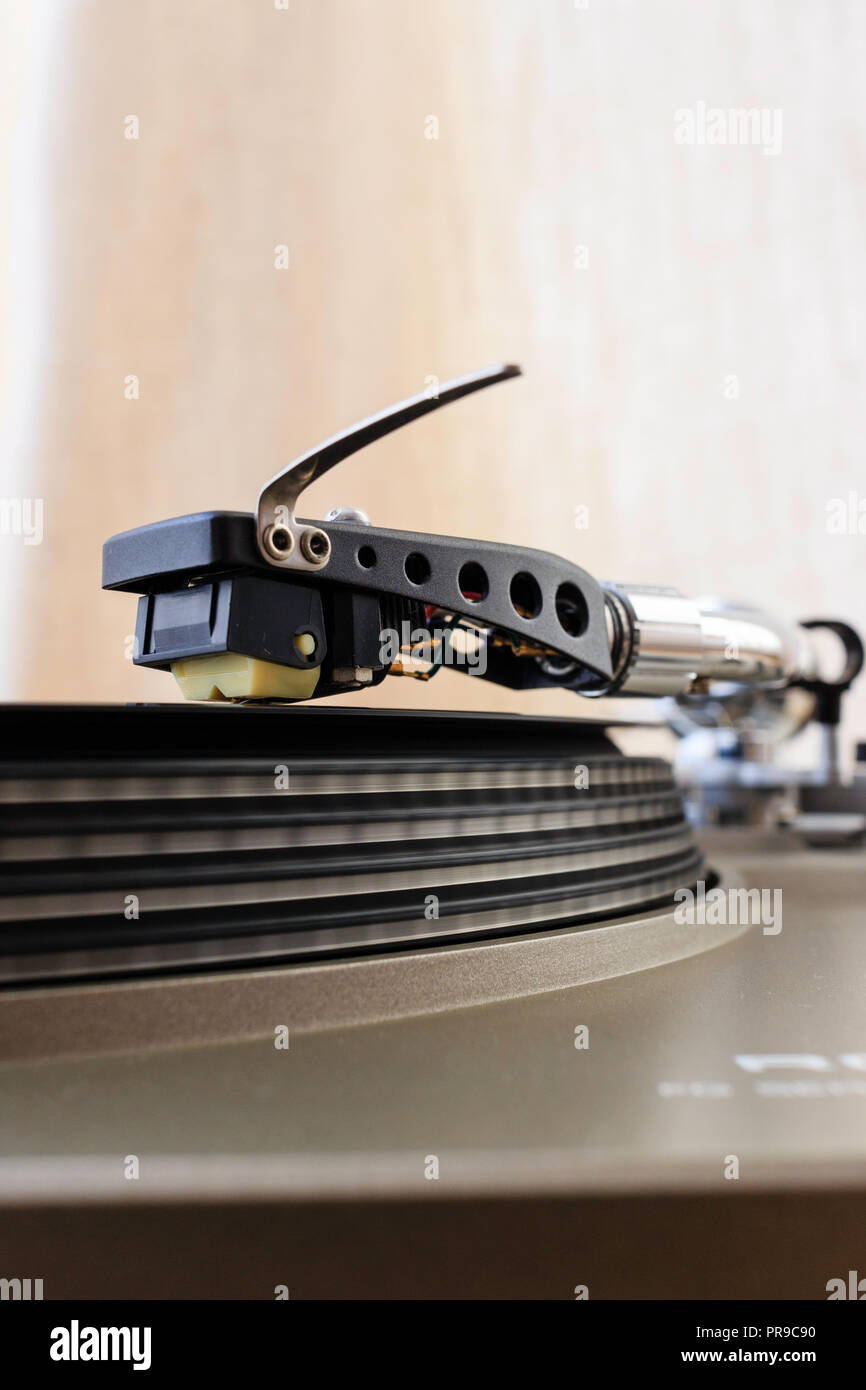 Record player, deck. 'S' shape tone arm playing long player record, LP ...