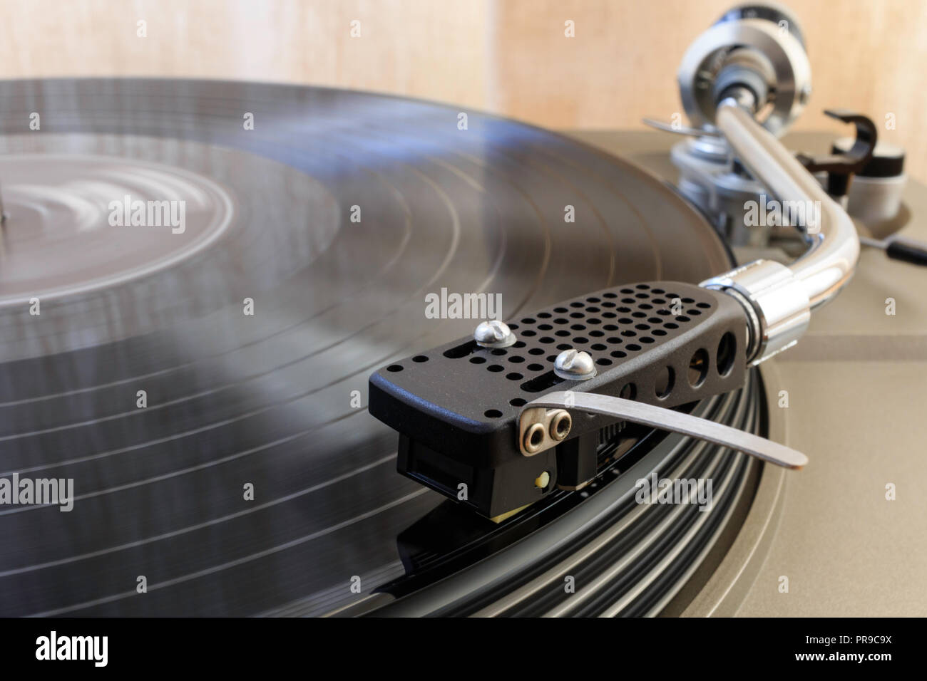 Record player, deck. 'S' shape tone arm playing long player record, LP ...