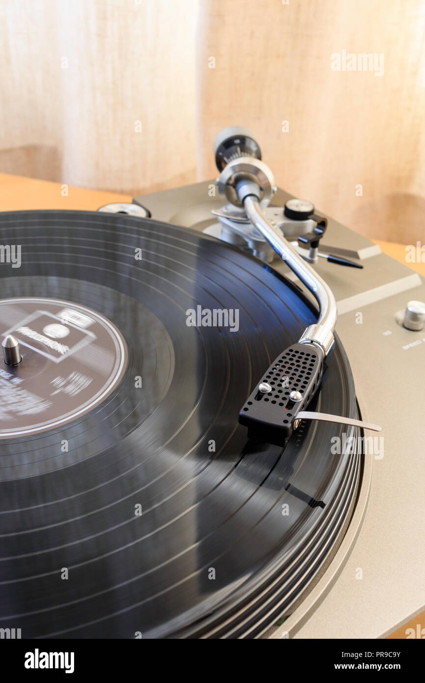 Record player, deck. 'S' shape tone arm playing long player record, LP ...