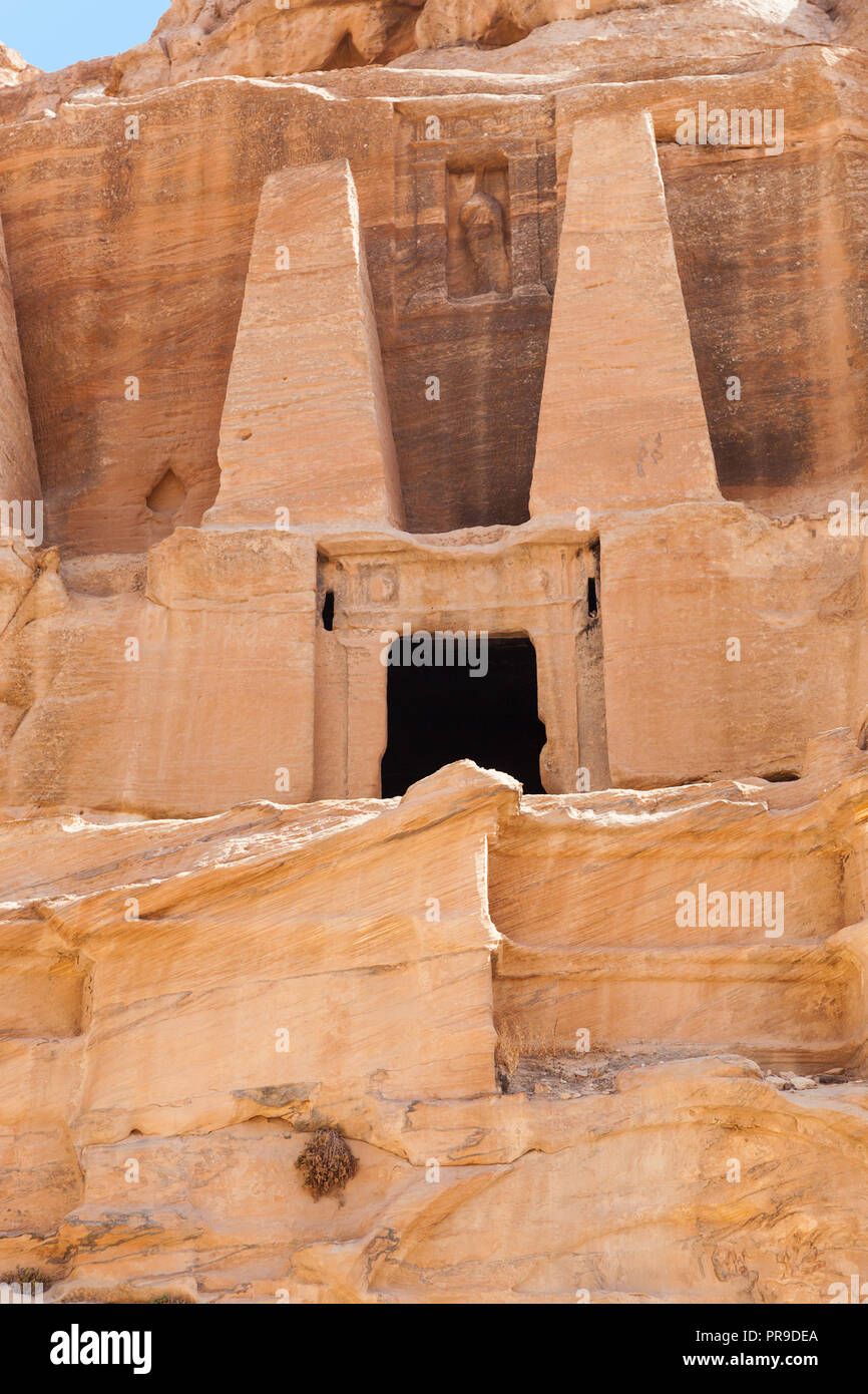 A view of an entrance will pillars to one of the ancient buildings ...