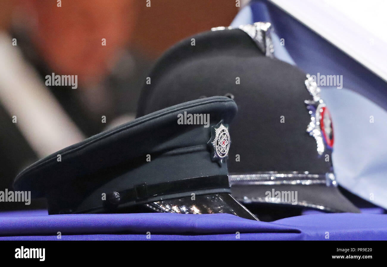 A PSNI hat and a bobby's helmet seen during the service at at the ...