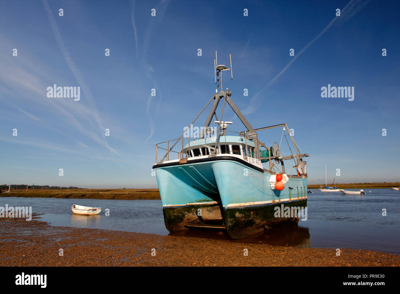 Fishing Boat named Speedwell, resting with it's keels on the mud at low ...