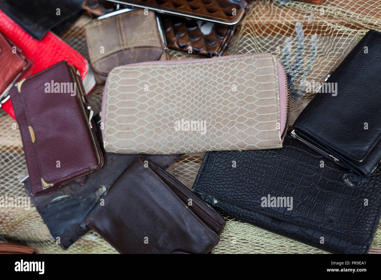 many old purses for money background v Stock Photo - Alamy