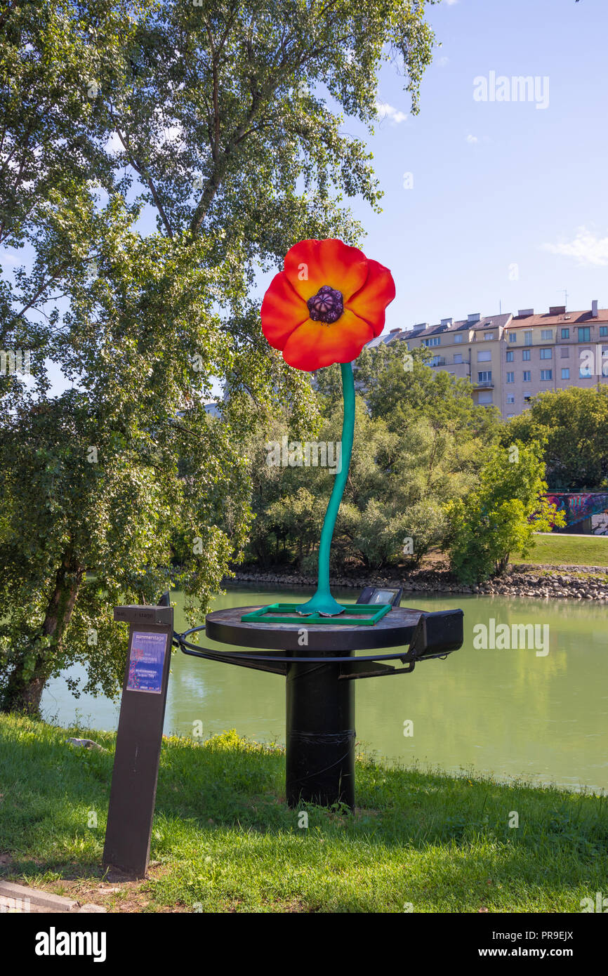 Jacques Tilly flower sculpture along the River Danube Vienna Stock ...
