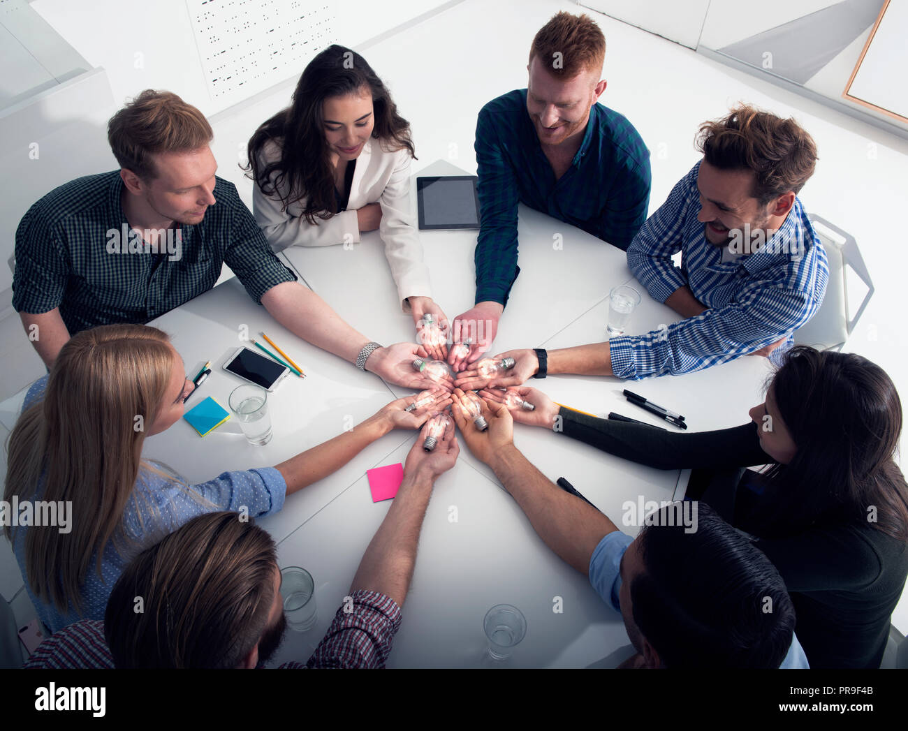 Teamwork and brainstorming concept with businessmen that share an idea ...