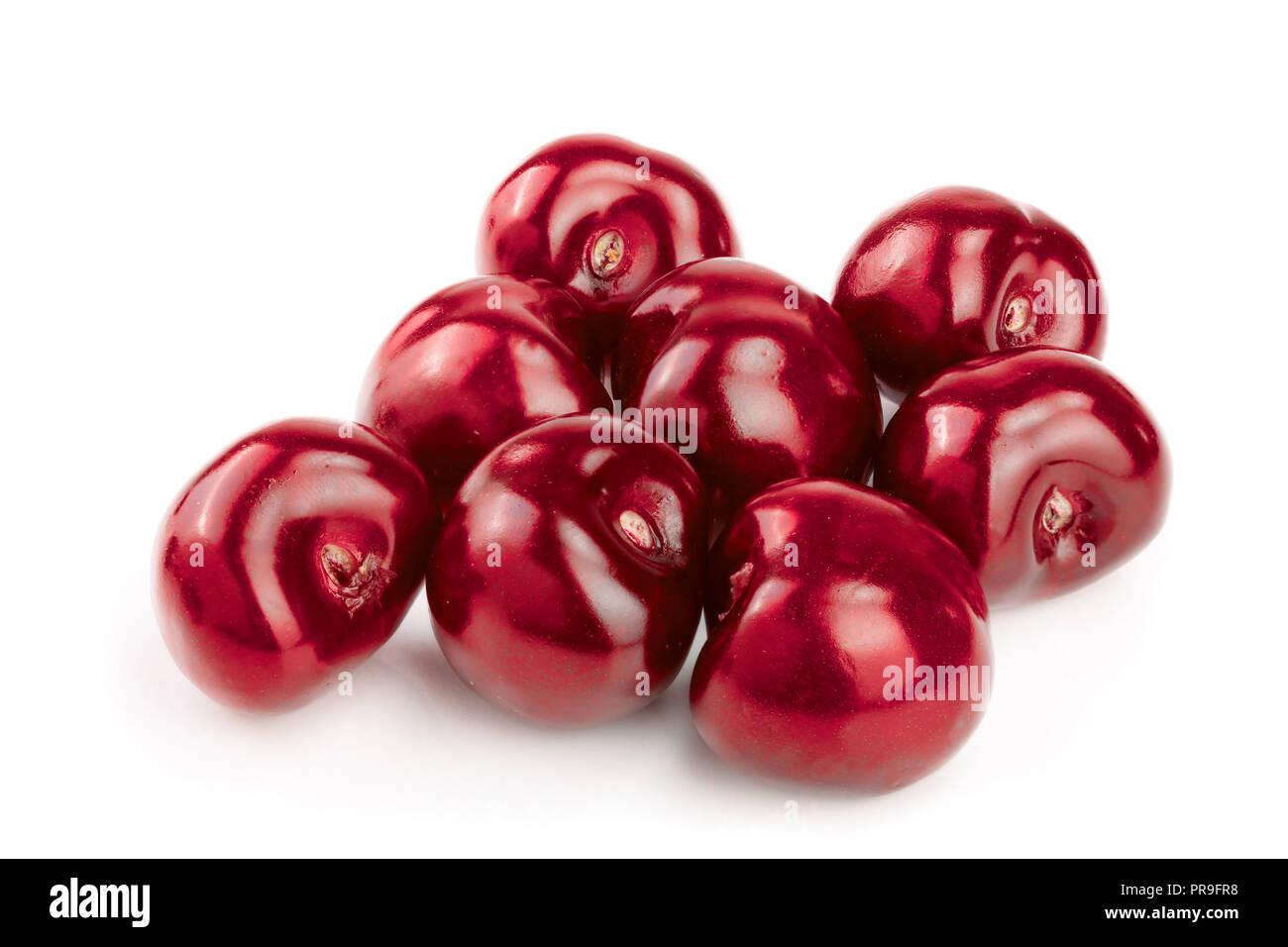 Sweet red cherries isolated on white background macro Stock Photo - Alamy
