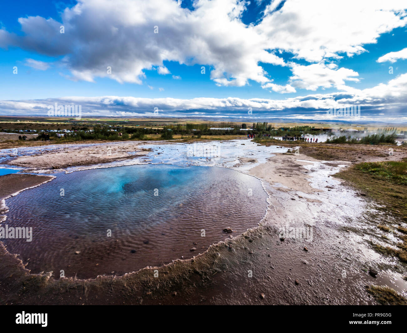 Steaming geothermal pool at Geyser at the Golden Circle Iceland Stock ...