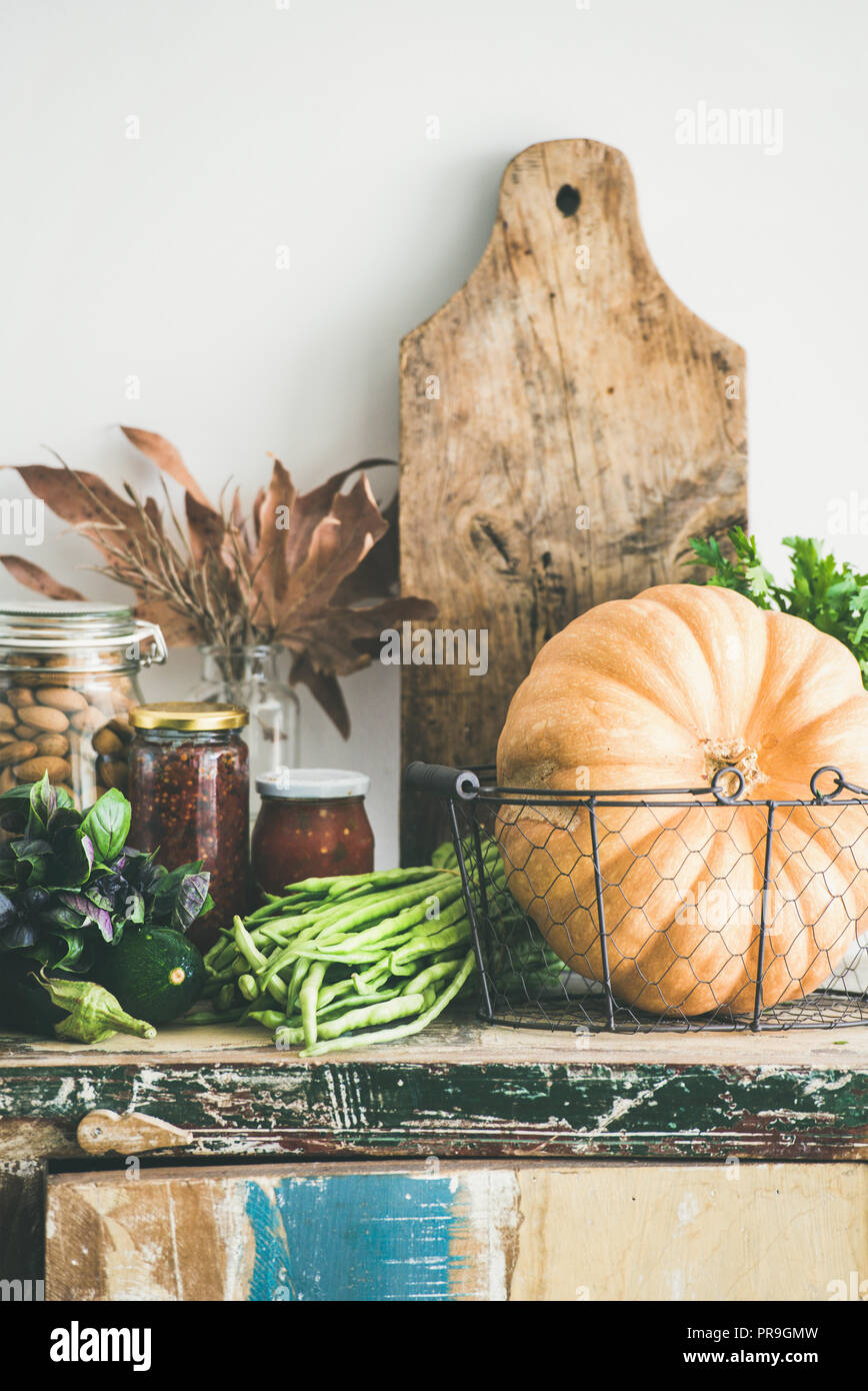 Autumn food ingredients and utensils over cupboard chest Stock Photo ...
