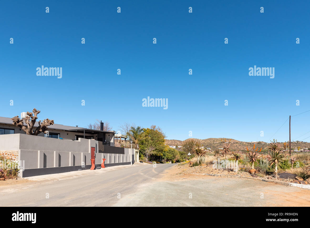 VANDERKLOOF, SOUTH AFRICA, AUGUST 6, A street scene with a house and ...