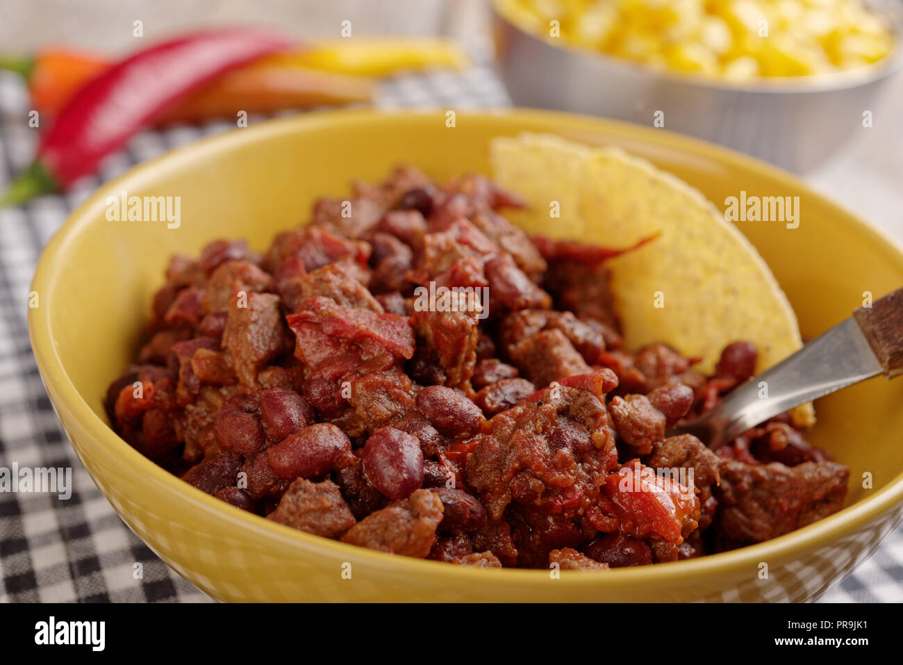 Chili con carne with corn and corn chips Stock Photo - Alamy