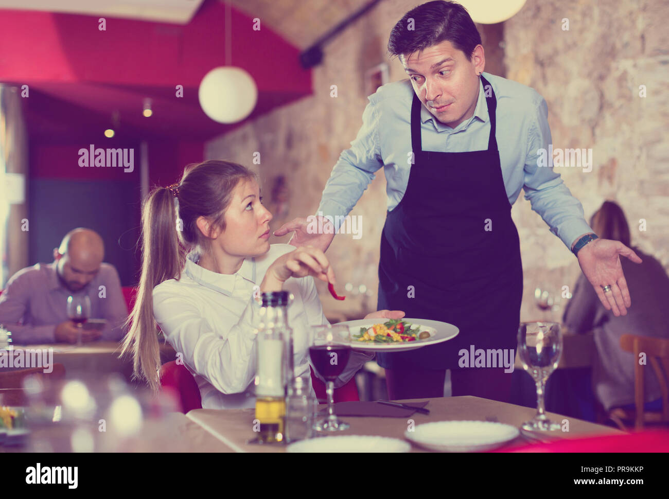 Waiter woman unhappy hi-res stock photography and images - Alamy