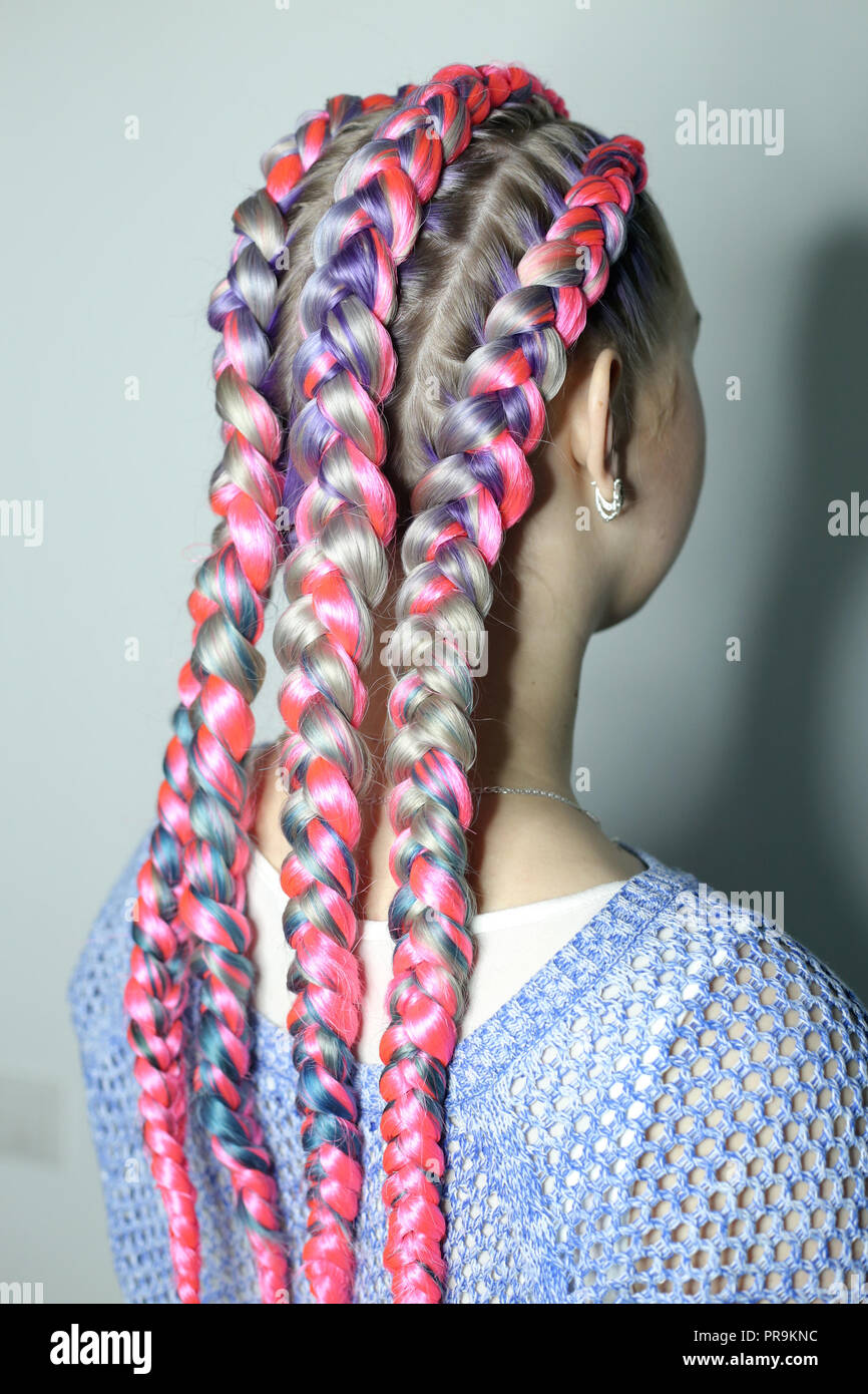 designer hairstyle of thick and thin braids, youth style, master Stock ...