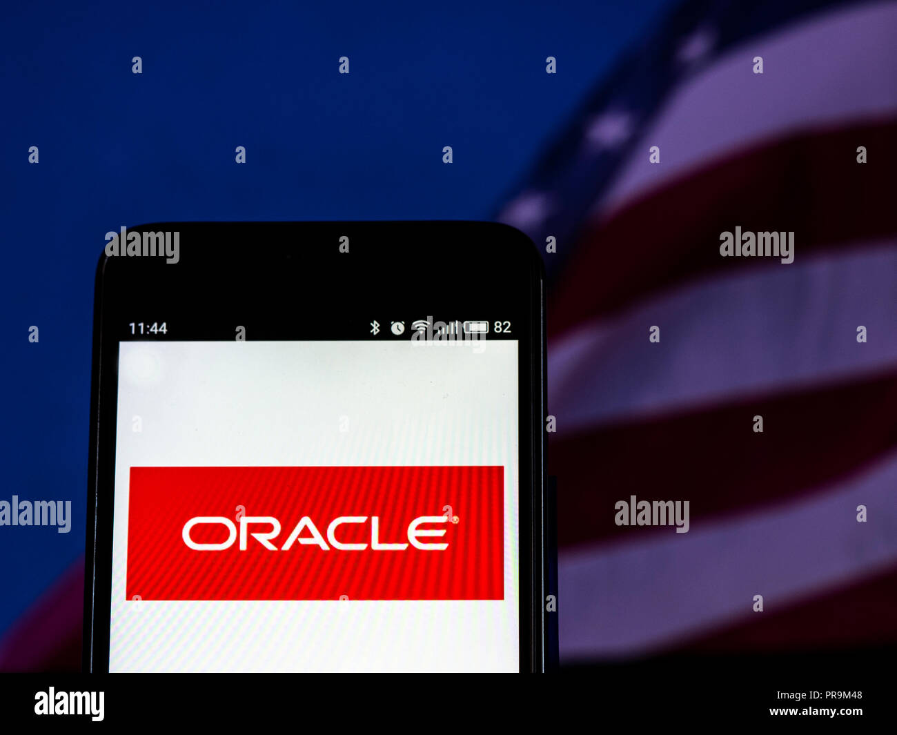 Oracle Corporation logo seen displayed on smart phone. Oracle ...