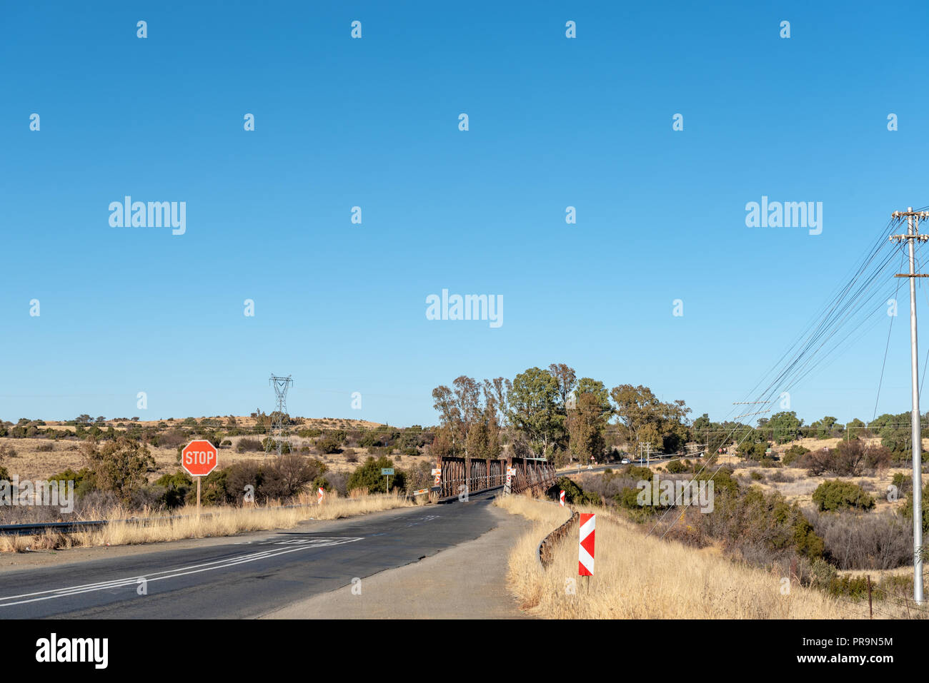 Single lane road bridge over the Riet River near Koffiefontein in the ...