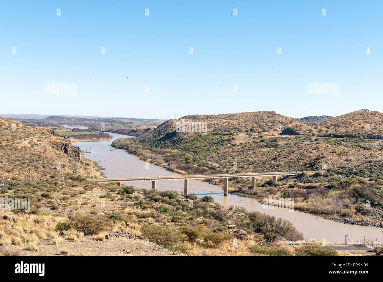 View downstream from the wall of the Vanderkloof Dam in the Orange ...