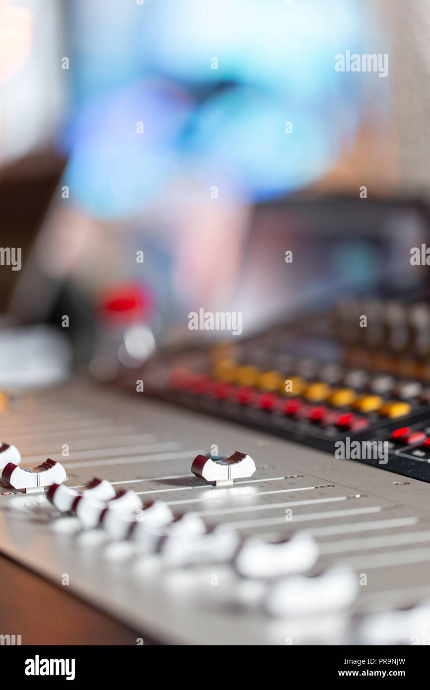 control Fader. Mixing console of light equipment operator at the ...