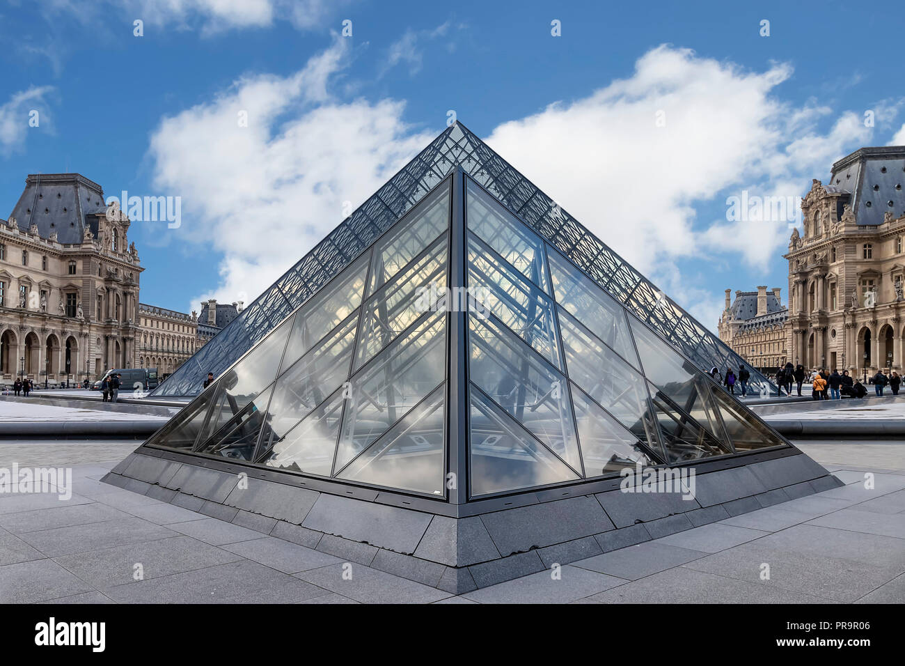 Paris, France - March 17, 2018: View of famous pyramids of Louvre ...