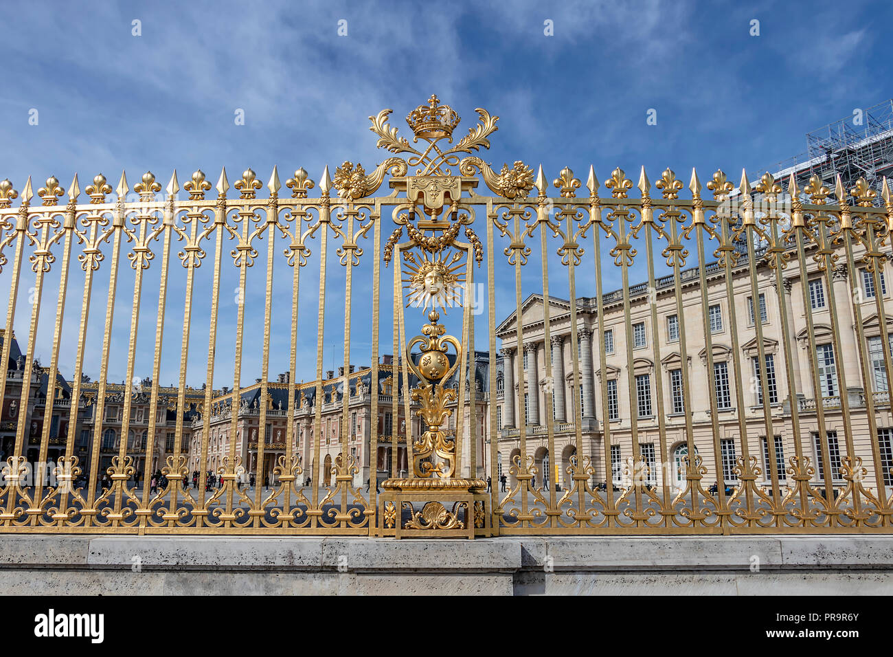 Golden fence in exterior facade of Versailles Palace, Paris, France ...