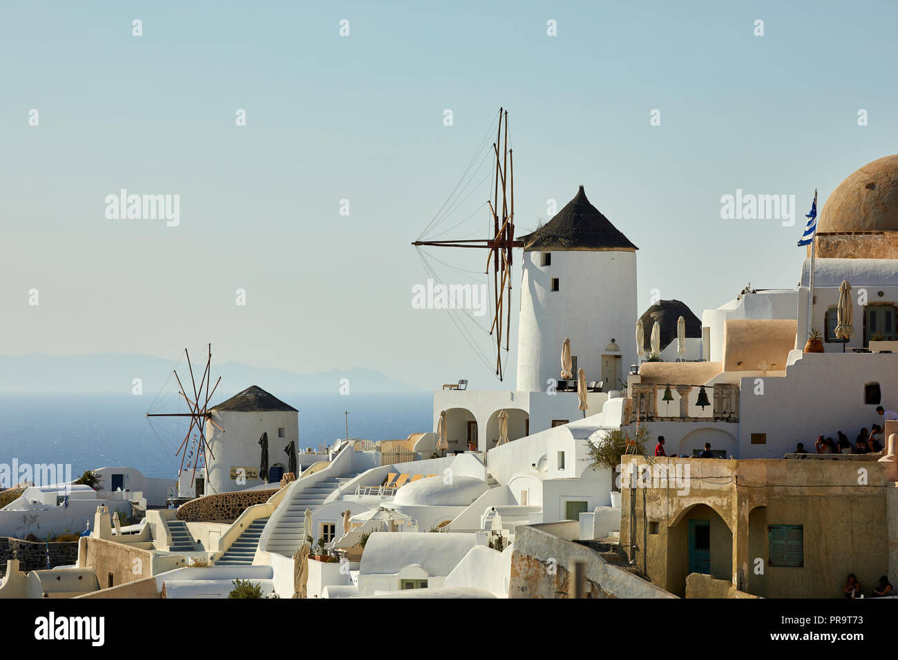 Oia landmark skyline with houses on the steep calder cliff side ...