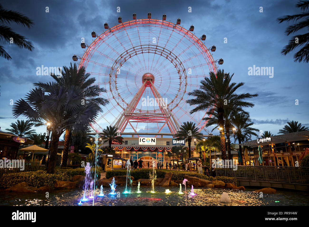 Ferris Wheel Funfair rides at night fall in orlando Stock Photo - Alamy