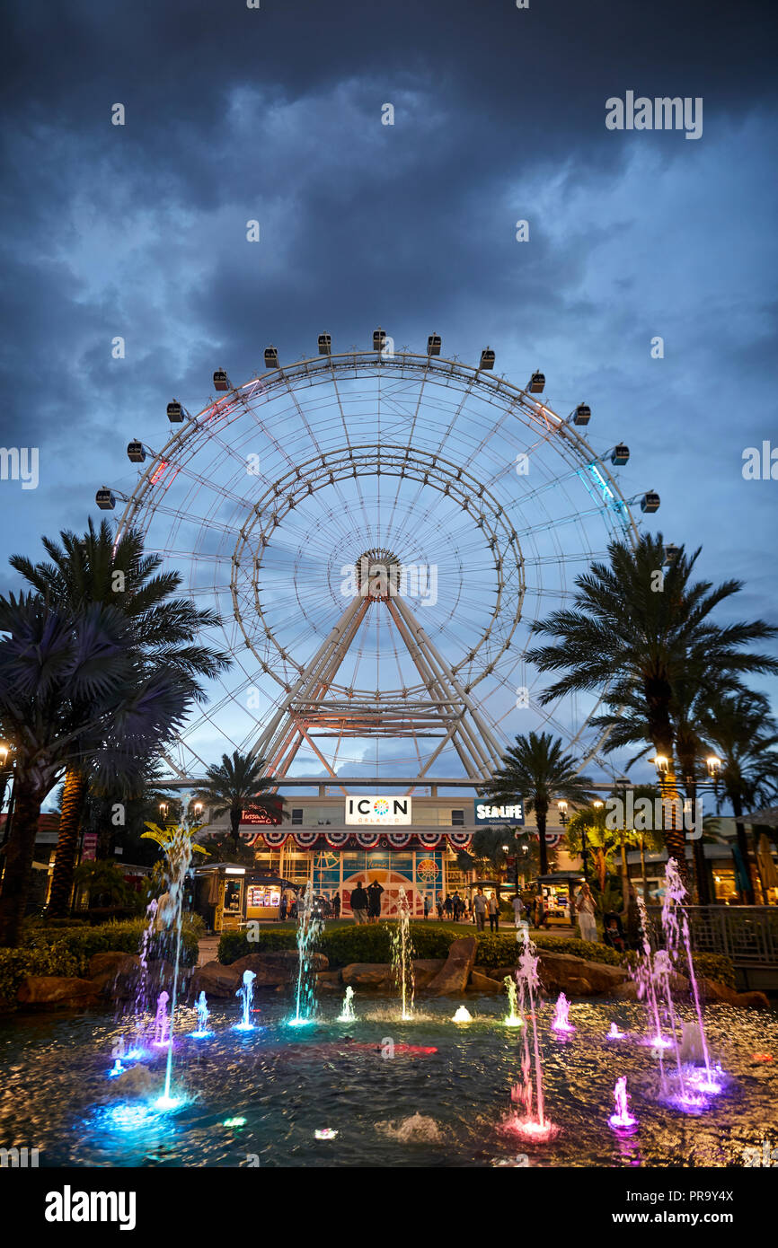 Ferris Wheel Funfair rides at night fall in orlando Stock Photo - Alamy