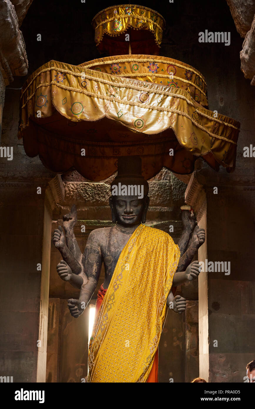 Statue of eight-armed Buddhist deity Marichi in Angkor Wat. The Angkor ...
