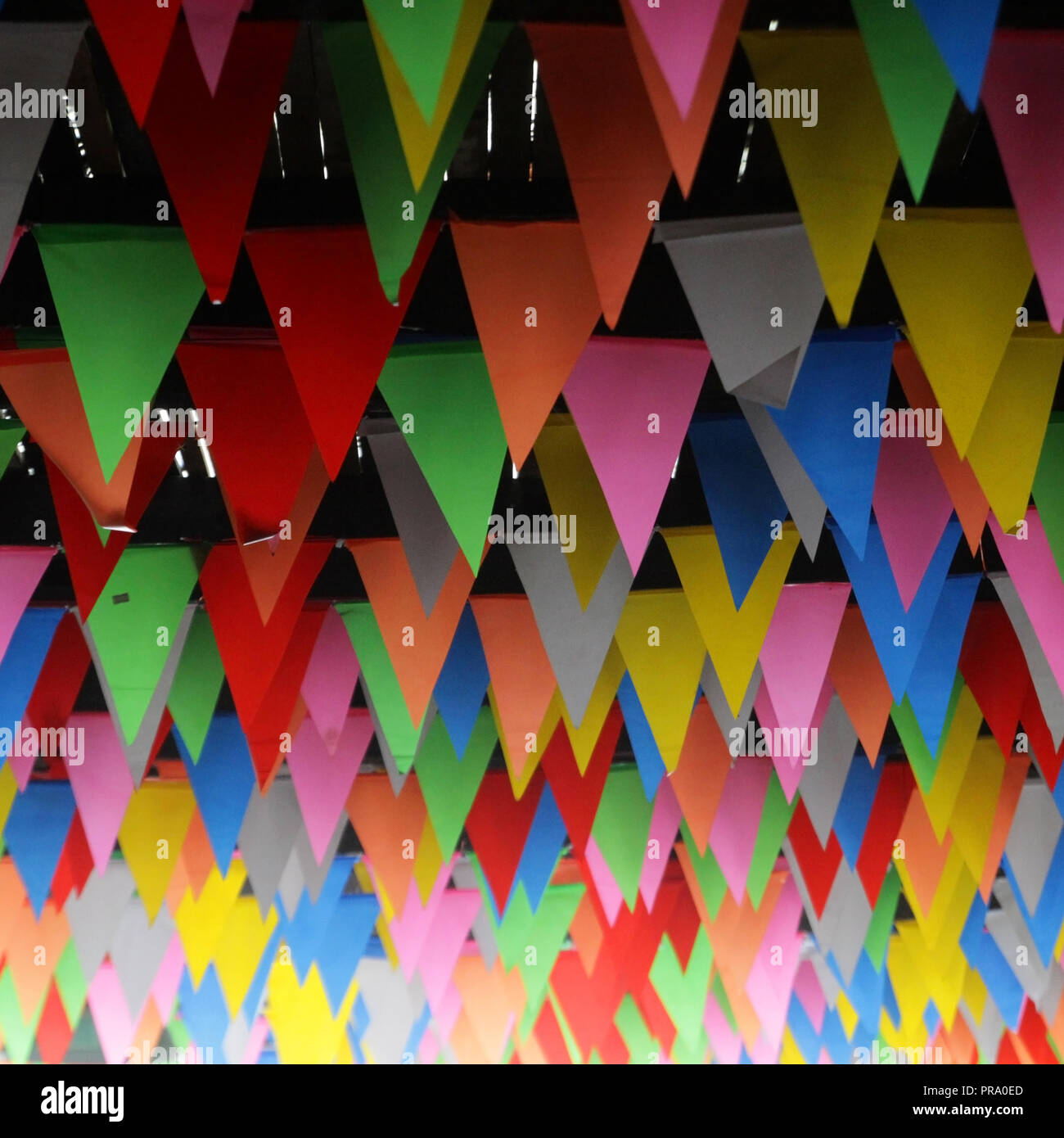 pile of colorful triangle flag decorated on the ceiling Stock Photo - Alamy