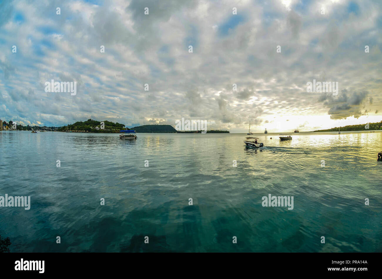 Little boats resting in the bay of Vanuatu Island Stock Photo - Alamy