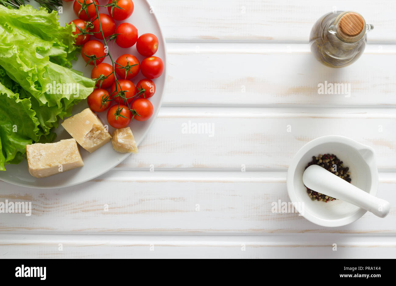 italian food ingredients on white wooden background Stock Photo - Alamy