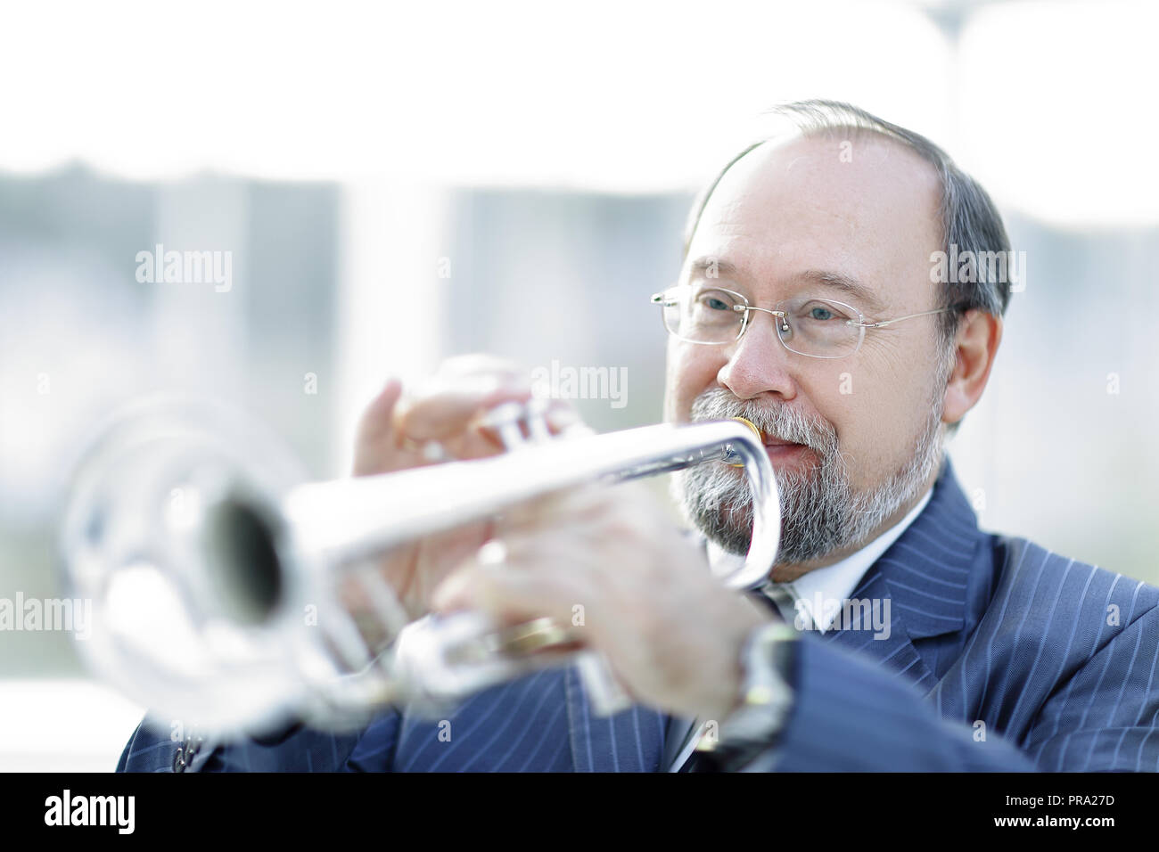 White hands playing a trumpet hi-res stock photography and images - Alamy