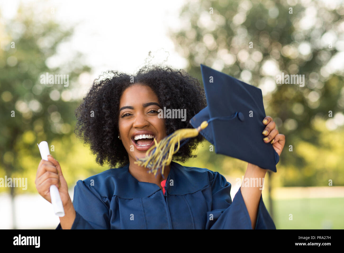 Holding certificate african american hi-res stock photography and ...