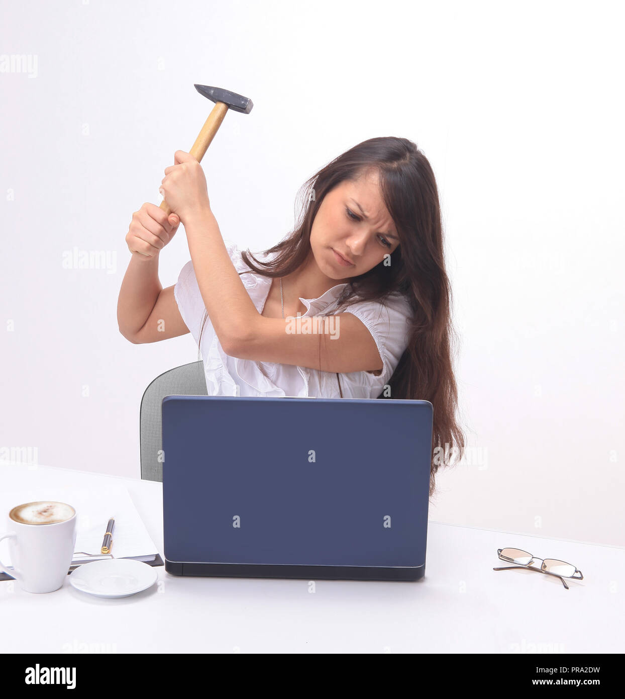 Woman smashing laptop hammer hi-res stock photography and images - Alamy