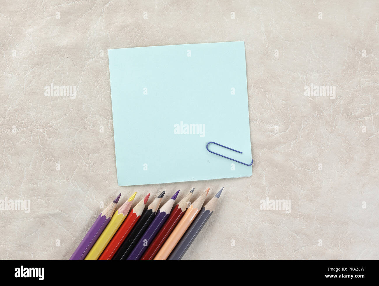 sheet of paper for notes and colored pencils on paper background Stock ...