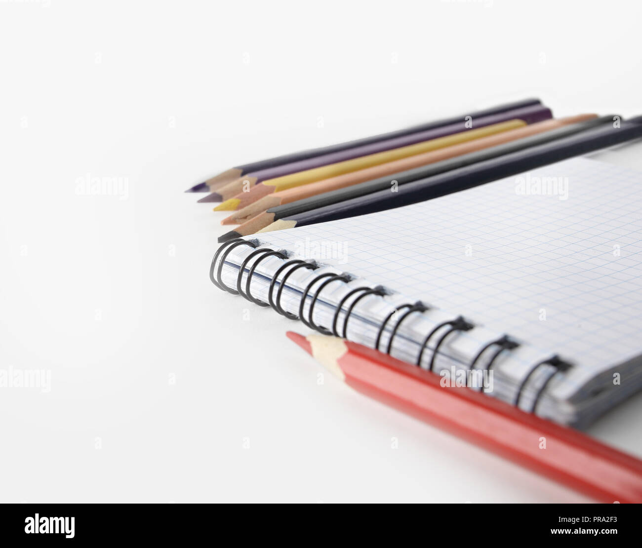 close up.Notepad and pencils on white background .photo with cop Stock ...