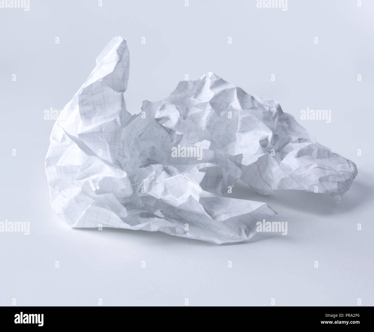 crumpled school notebook sheet on white background.photo with co Stock ...