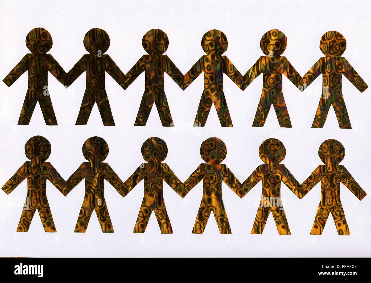 cut from Golden paper people on white background Stock Photo - Alamy