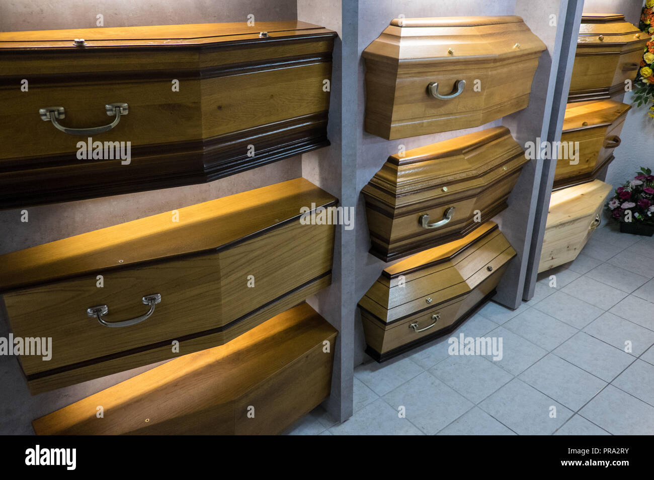 Funeral parlour,funeral directors,shop,with,coffins,plaques,and floral ...