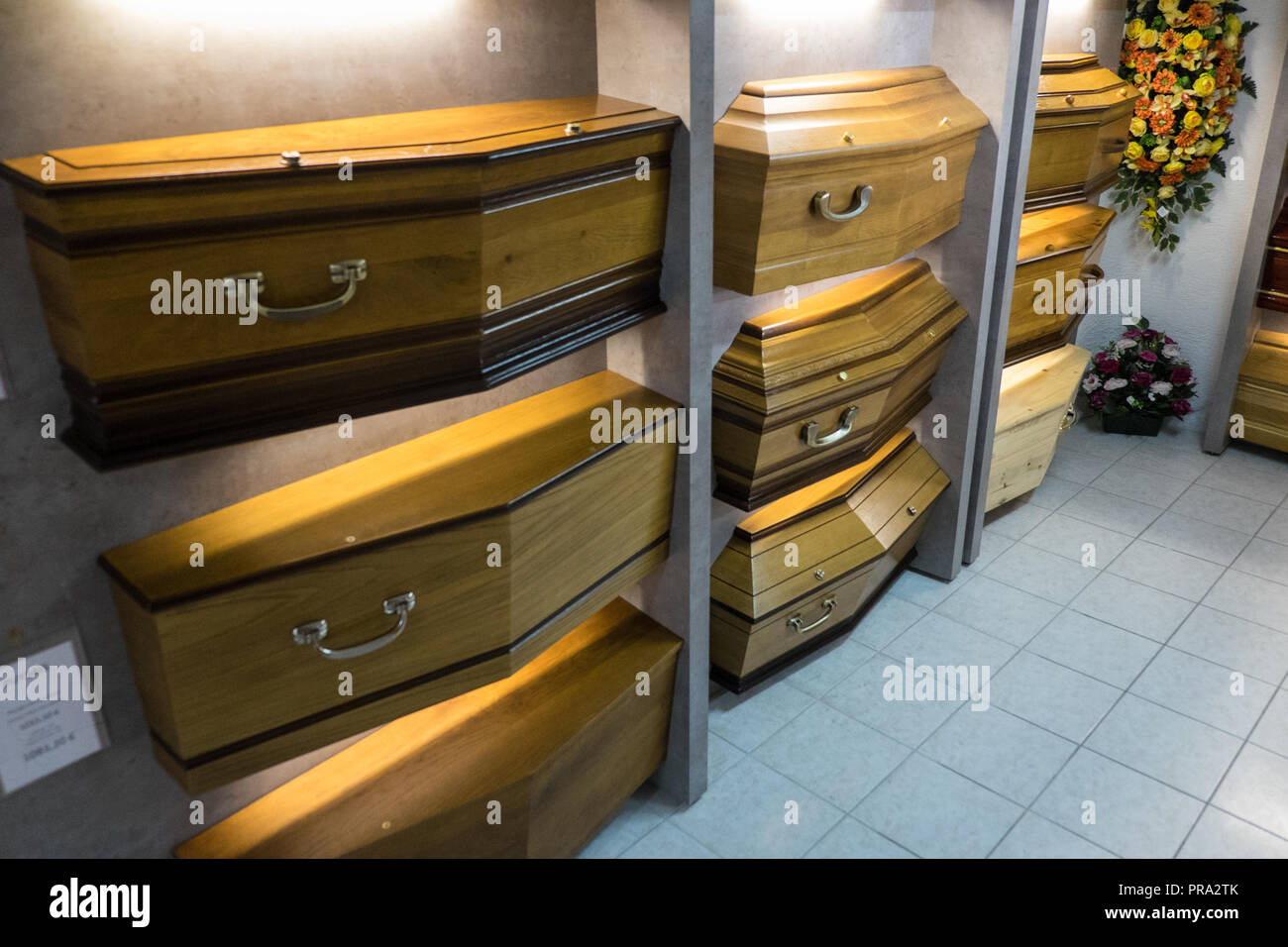 Funeral parlour,funeral directors,shop,with,coffins,plaques,and floral ...