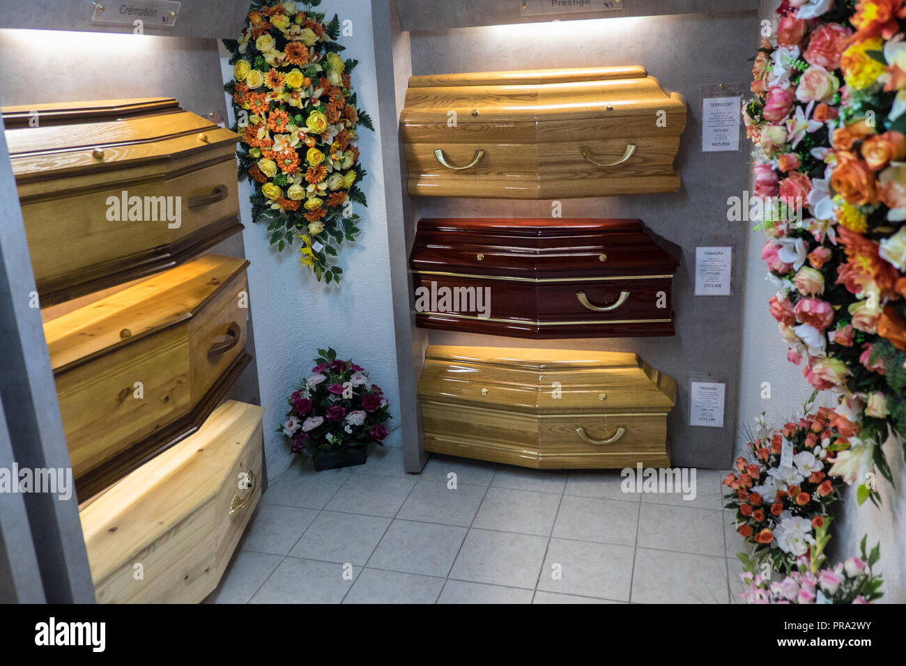 Funeral parlour,funeral directors,shop,with,coffins,plaques,and floral ...