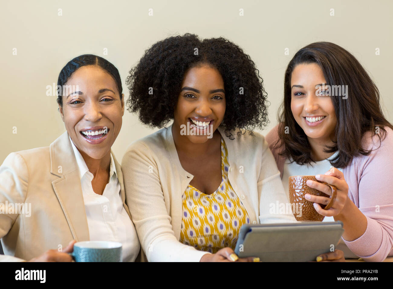Multi ethnic group of women at work Stock Photo - Alamy