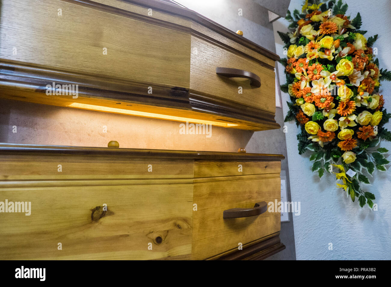 Funeral parlour,funeral directors,shop,with,coffins,plaques,and floral ...