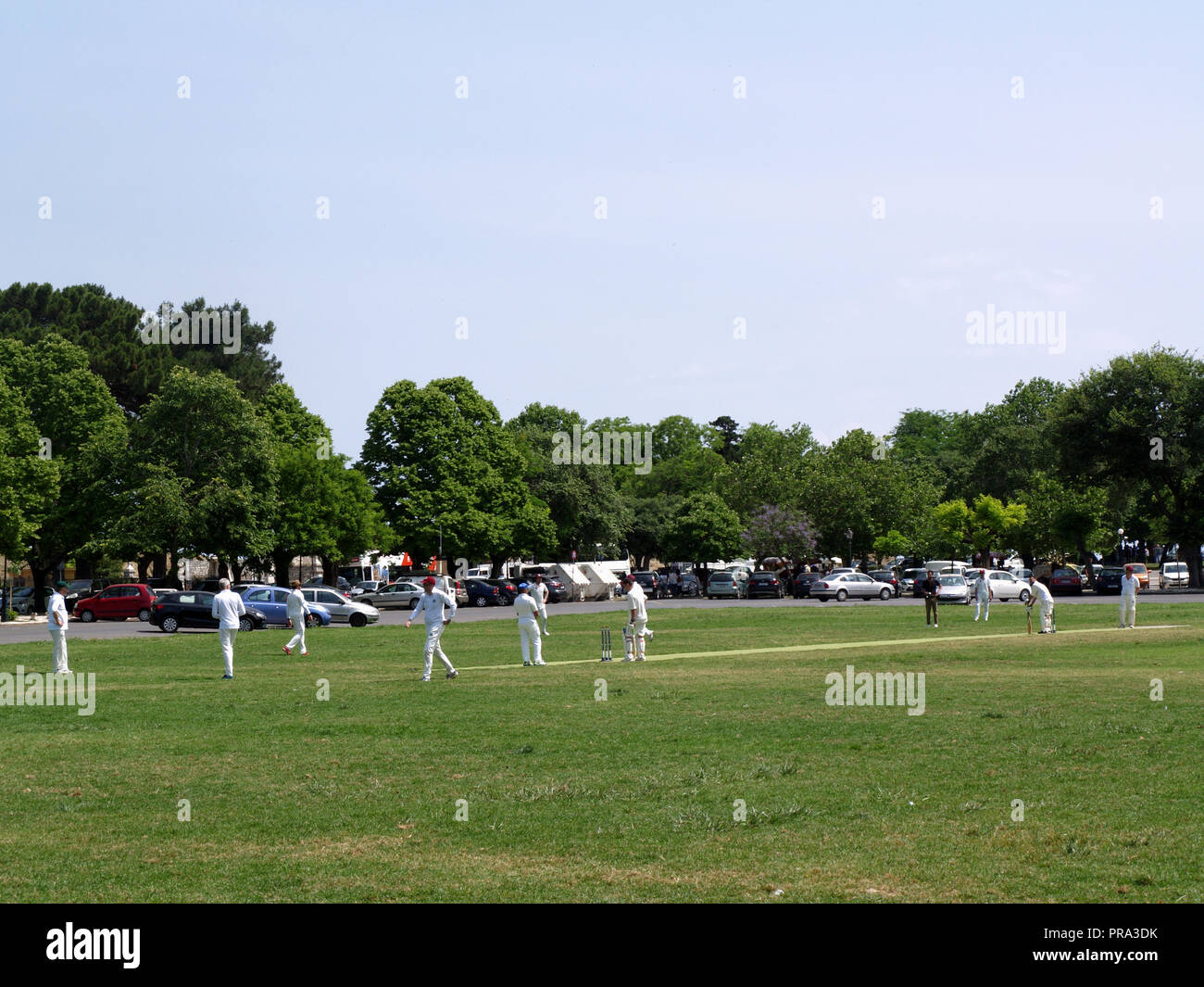 Cricket match in progress at The Liston, Corfu Town, Kerkyra, Greece ...