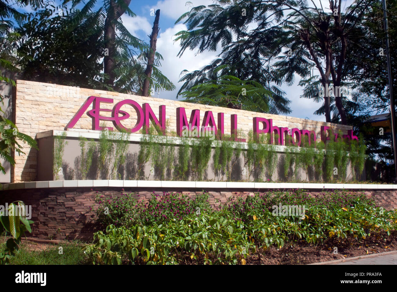A sign announces the entrance to the new and modern Aeon Shopping Mall ...