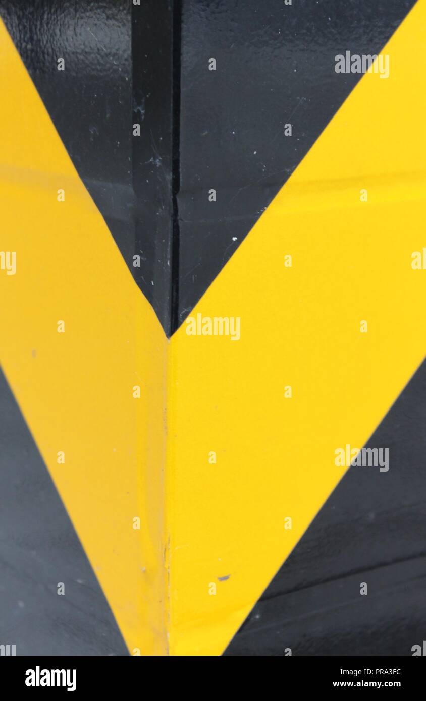Black and yellow zigzag sign Stock Photo - Alamy