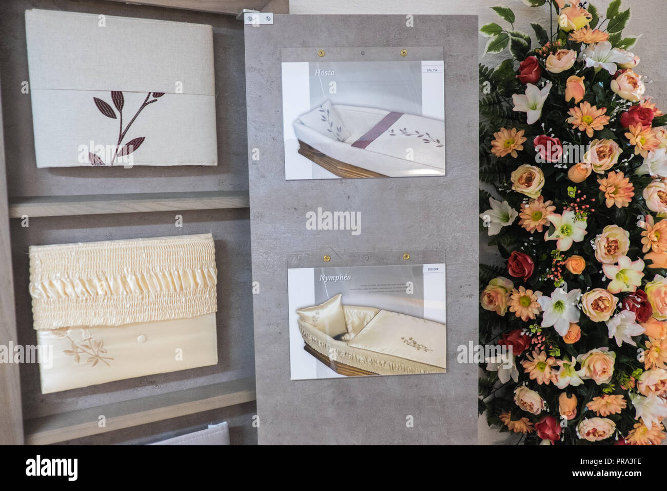 Funeral parlour,funeral directors,shop,with,coffins,plaques,and floral ...